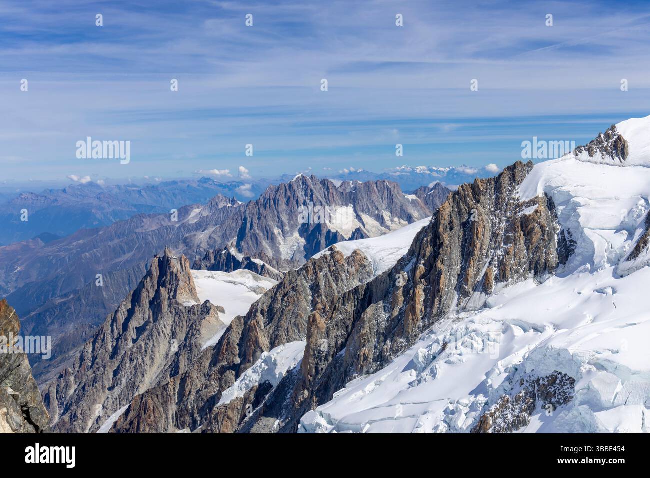 Aiguille du Midi peak above the clouds from the ascent to the summit of ...