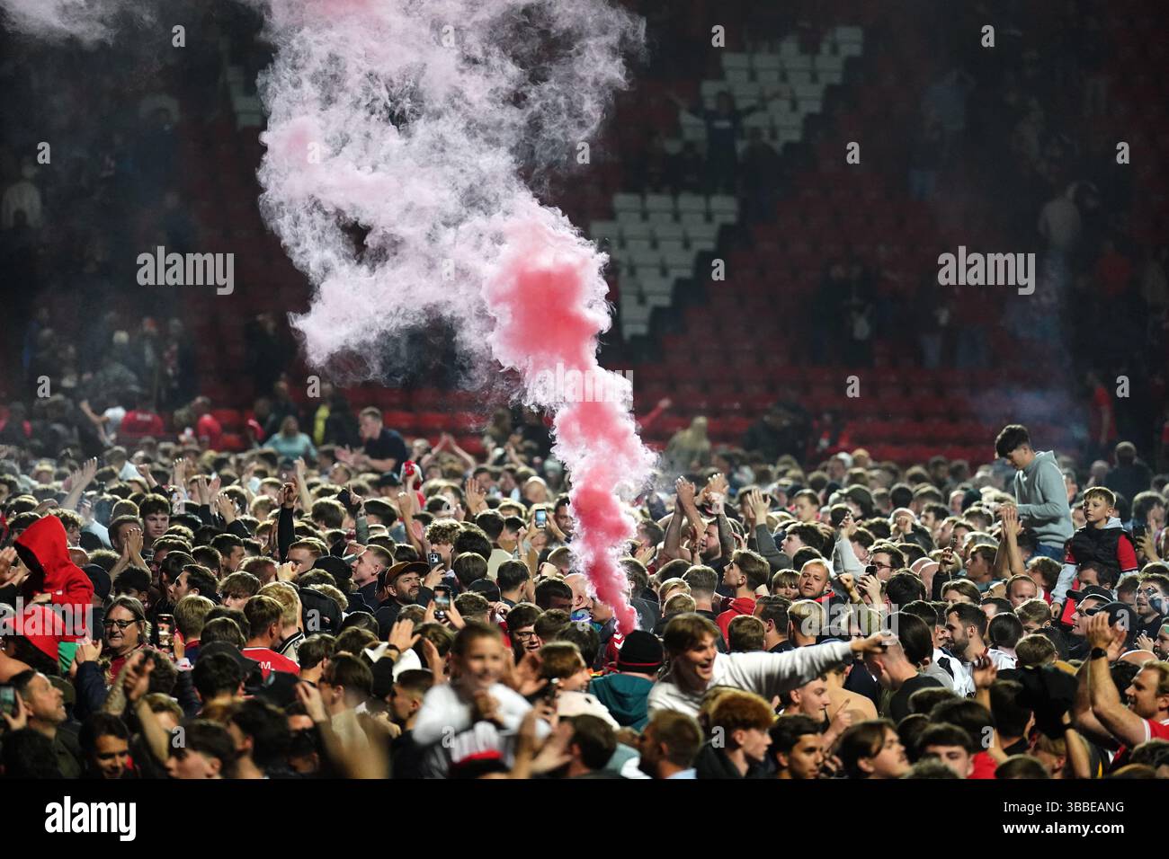 Charlton Athletic fans invade the pitch to celebrate the win after the ...