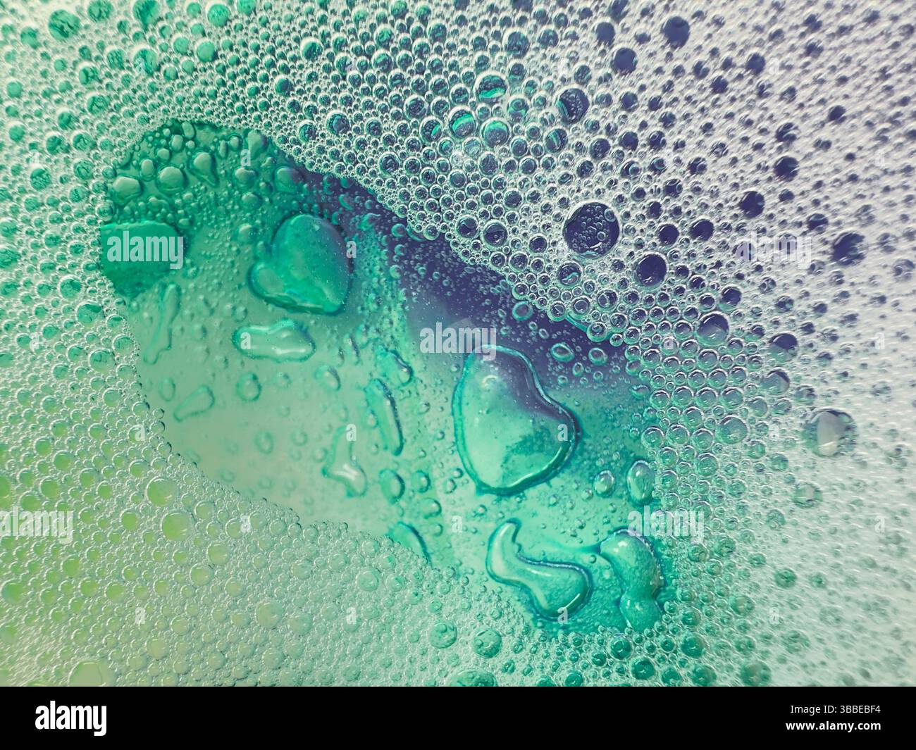 Green footprint with hearts floating in artistic manner moves across ...