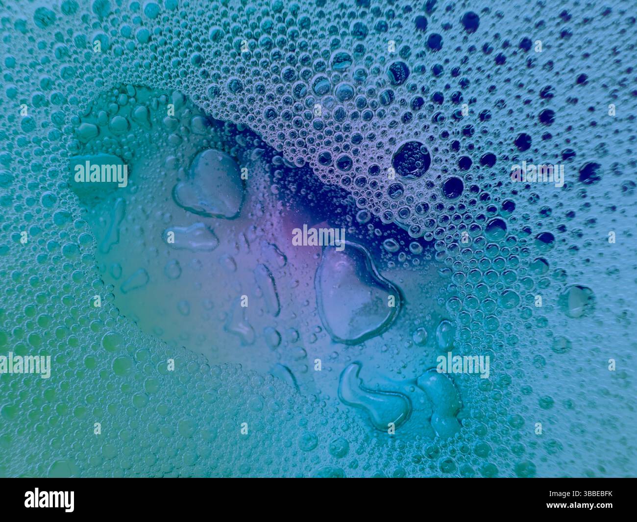Blue green bubbles with hearts floating in artistic manner move across ...