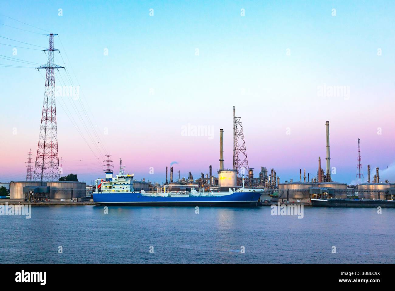 Oil ship docked at the oil berth in oil refinery Stock Photo - Alamy