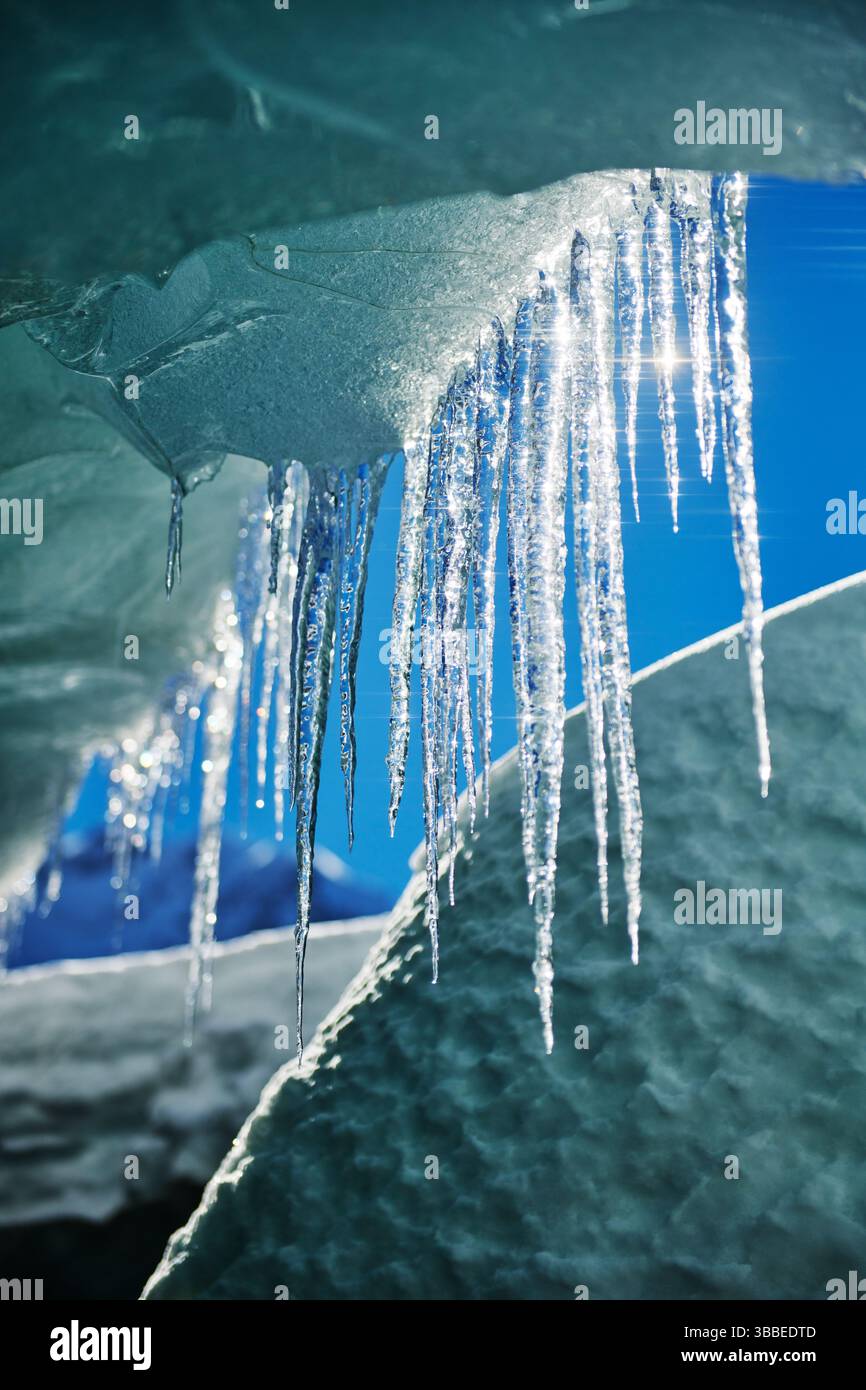 close up of icicles forming around the exterior of the. Morteratsch ...