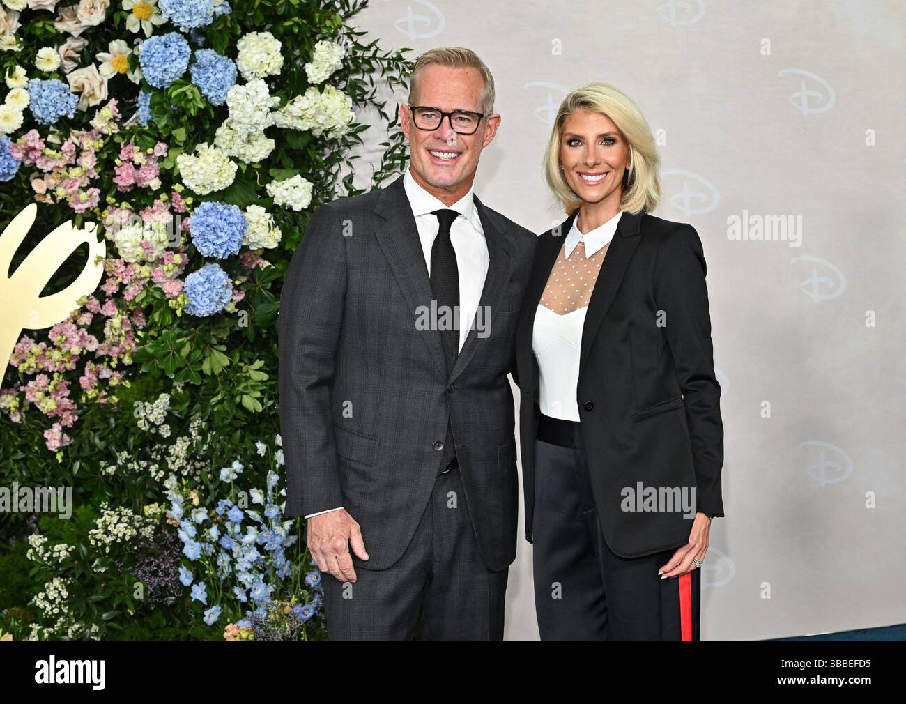 Joe Buck, left, and Michelle Beisner-Buck attend the Disney 2025 ...