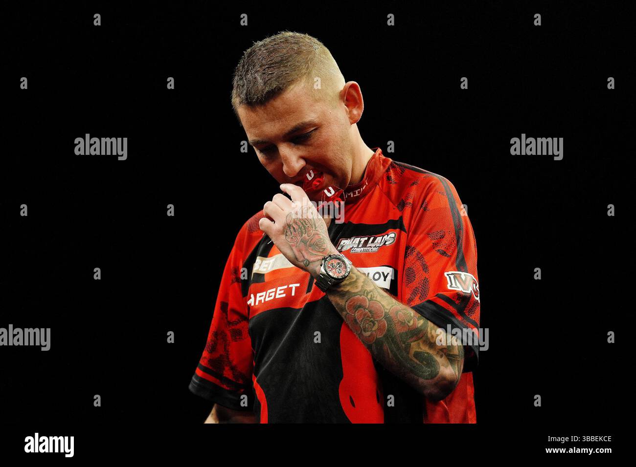 Nathan Aspinall reacts during the final against Chris Dobey on night ...