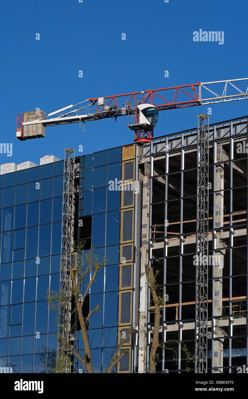 Building construction, glazing the facade of an office building. Object ...