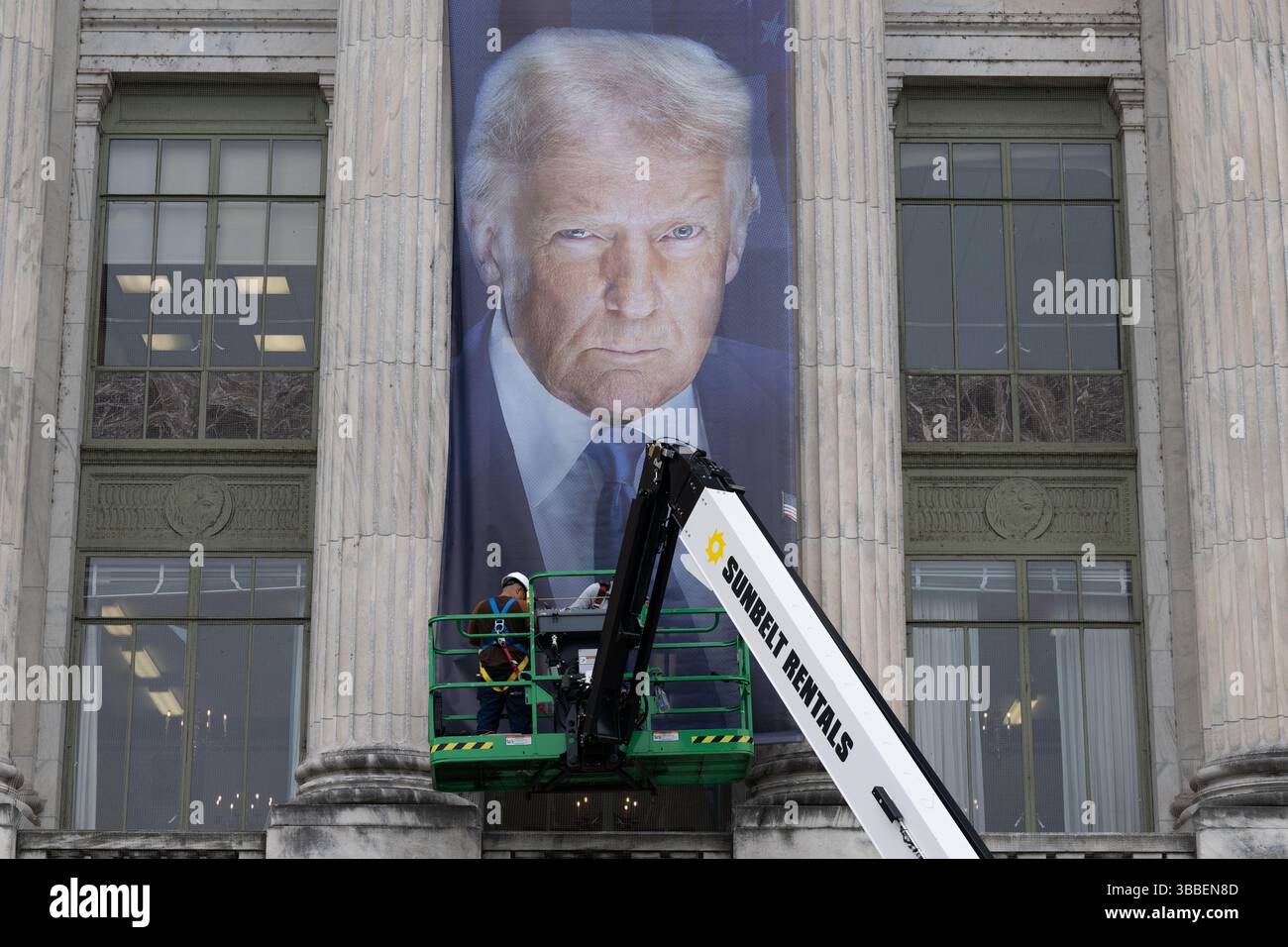 Washington, United States. 14th May, 2025. Workers hang an enormous ...