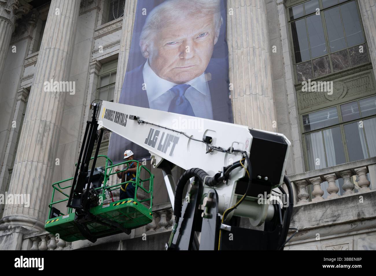 Washington, United States. 14th May, 2025. Workers hang an enormous ...