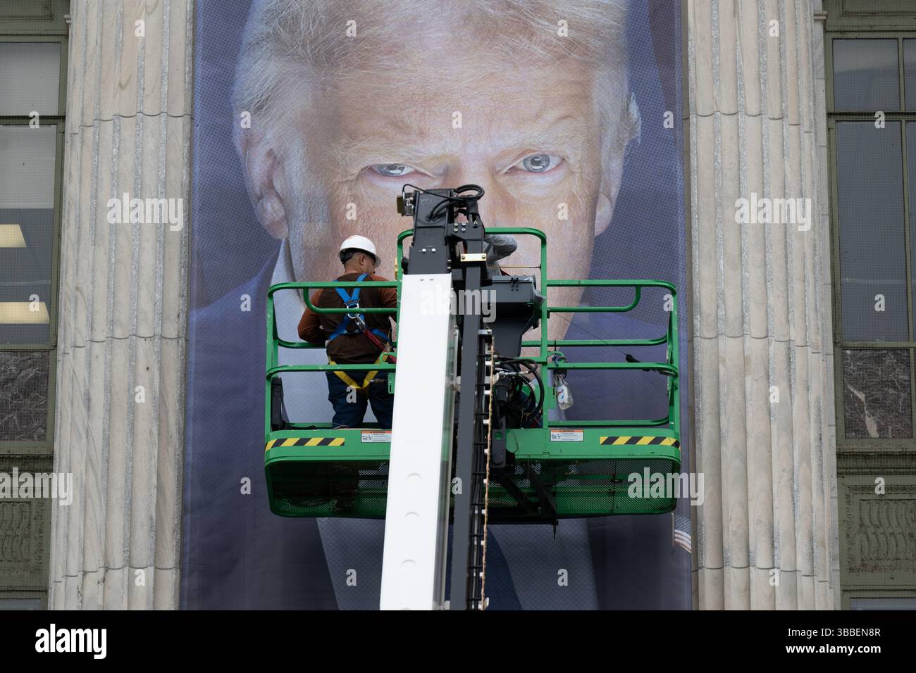 Washington, United States. 14th May, 2025. Workers hang an enormous ...