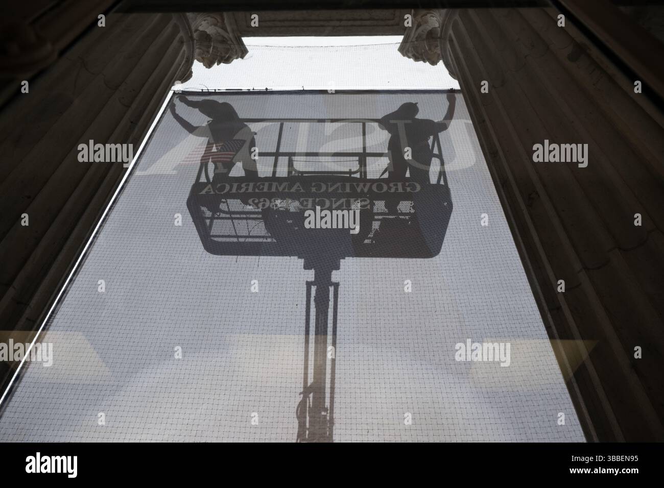 Washington, United States. 14th May, 2025. Workers secure an enormous ...