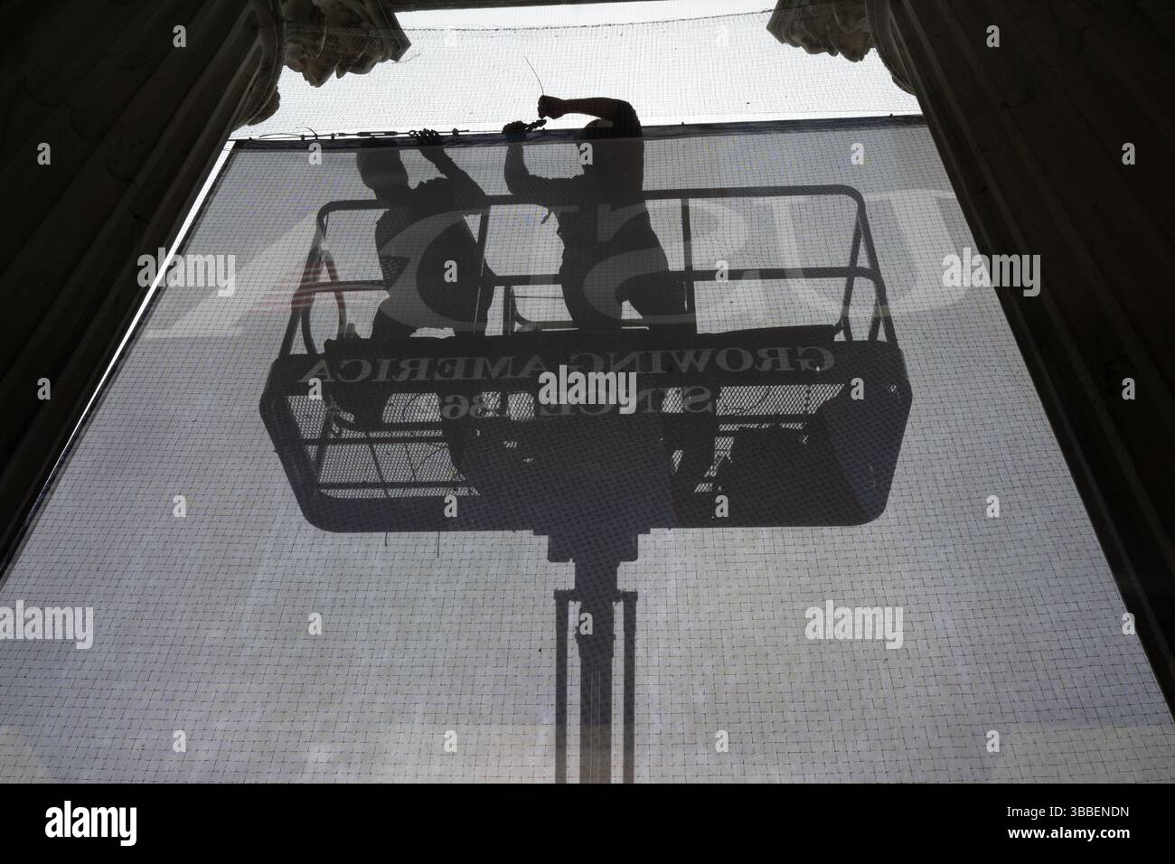 Washington, United States. 14th May, 2025. Workers secure an enormous ...