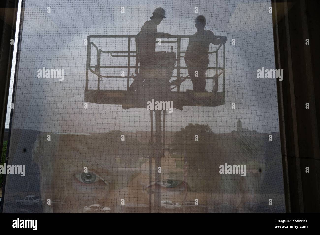 Washington, United States. 14th May, 2025. Workers secure an enormous ...