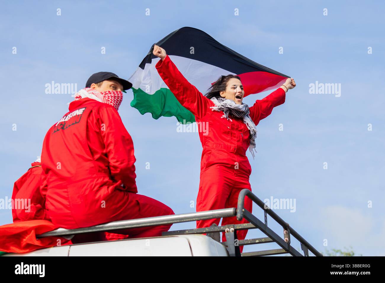 Bristol, UK. 15 MAY, 2025. Dr Rahmeh Aladwan holds Palestine flag as ...