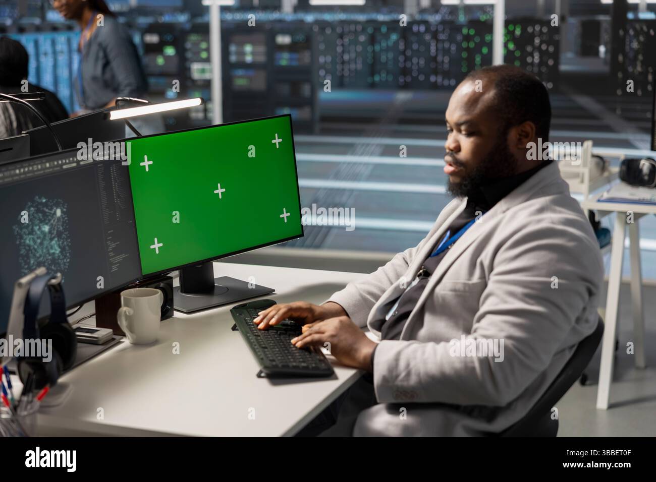 Data center engineer analyzing software logs metrics on green screen ...