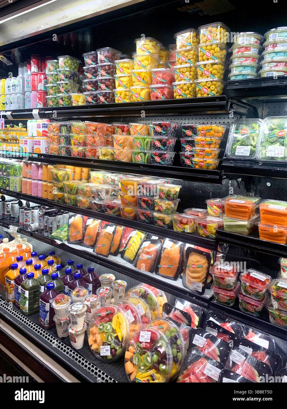 Sliced Fruit Section in Grocery Store Stock Photo - Alamy