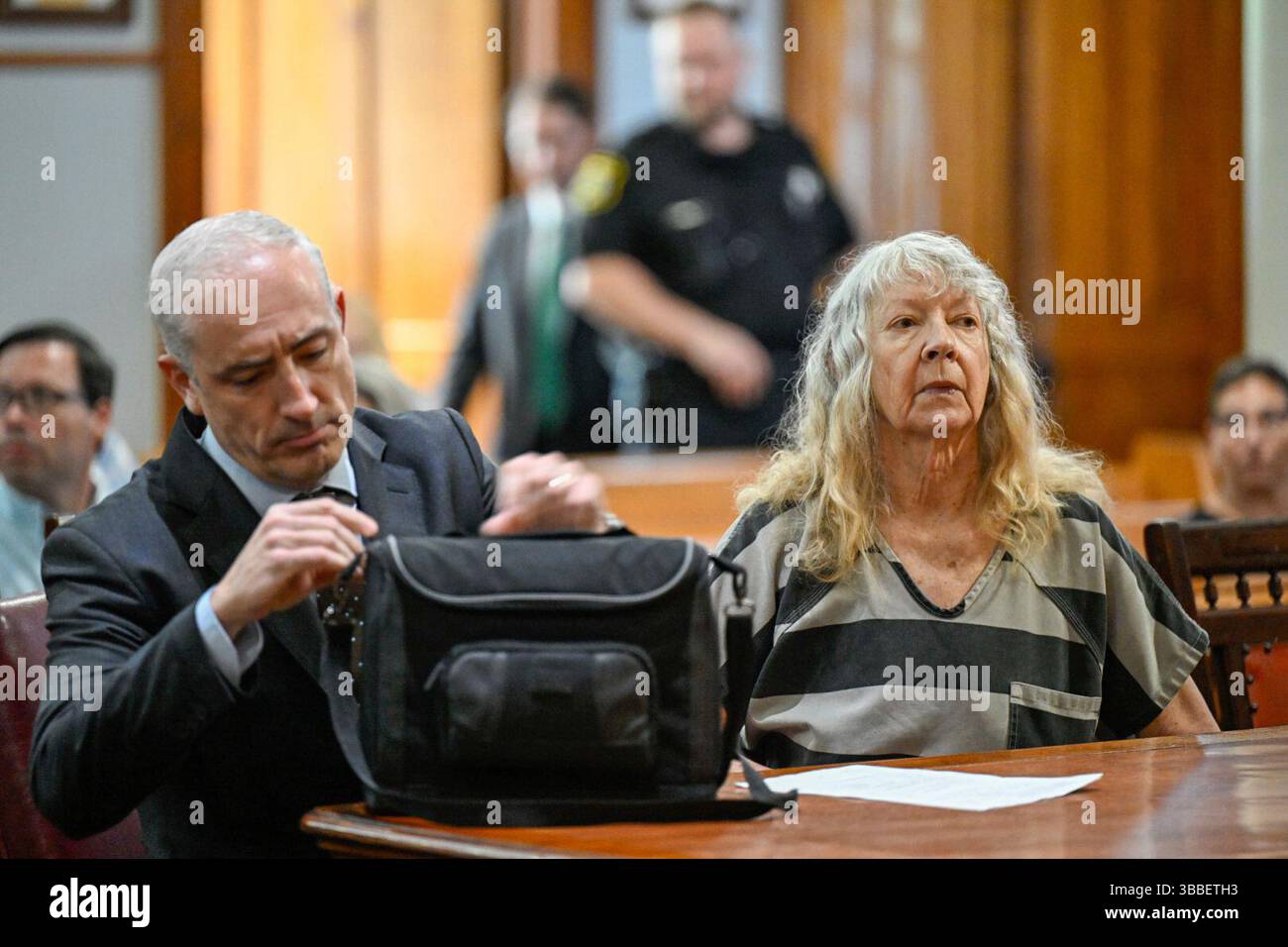 Marshella Chidester sits beside her attorney during her sentencing in ...