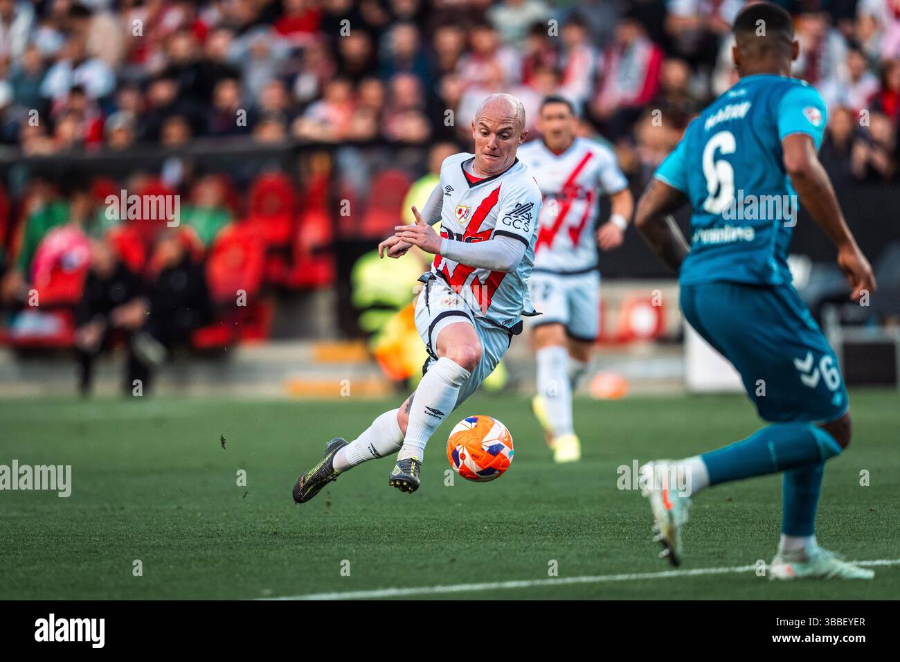 Isi Palazon of Rayo Vallecano and Natan of Real Betis during the ...
