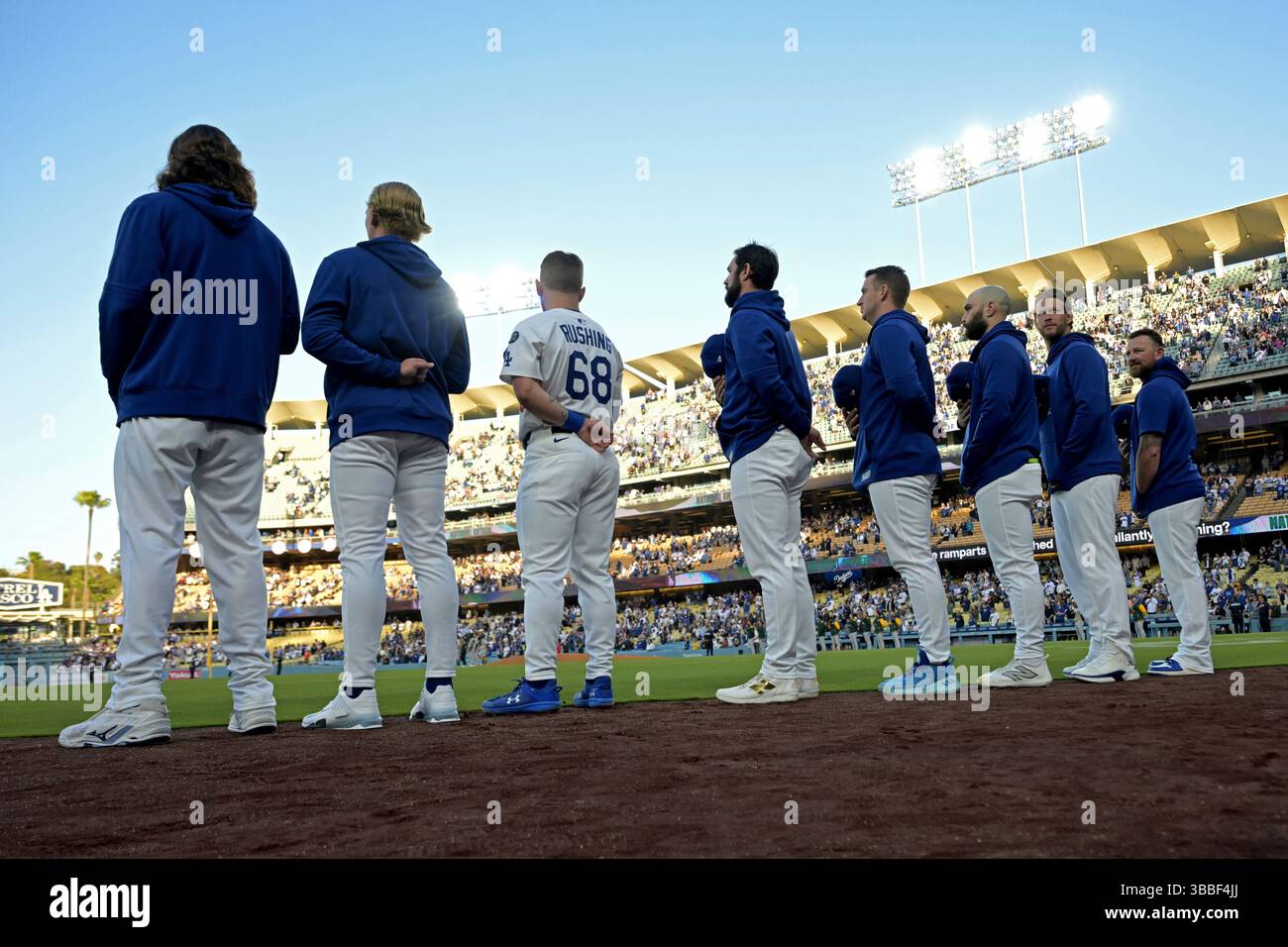Los Angeles Dodgers catcher Dalton Rushing (68) stands among players ...