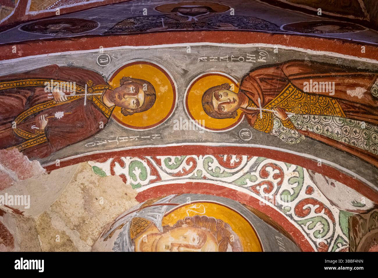 A fresco of martyrs in Elmali Church, Goreme, depicts saints in long ...