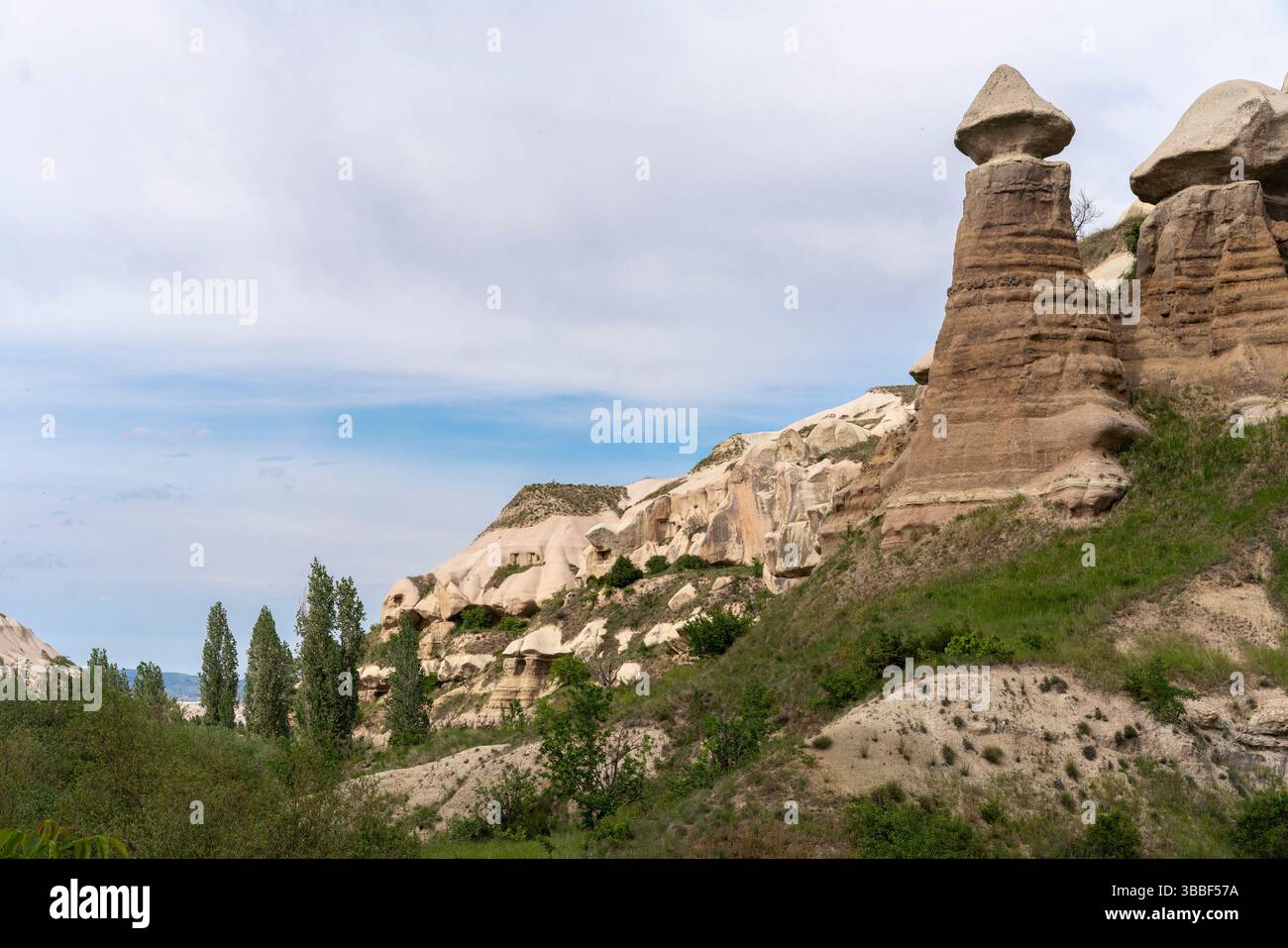 Rock formations shaped like fairy chimneys rise in Cappadocia’s Pigeon ...