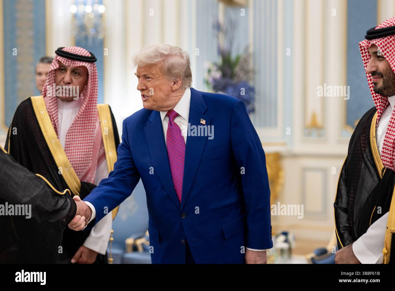 President Donald Trump greets officials during a welcome ceremony at ...