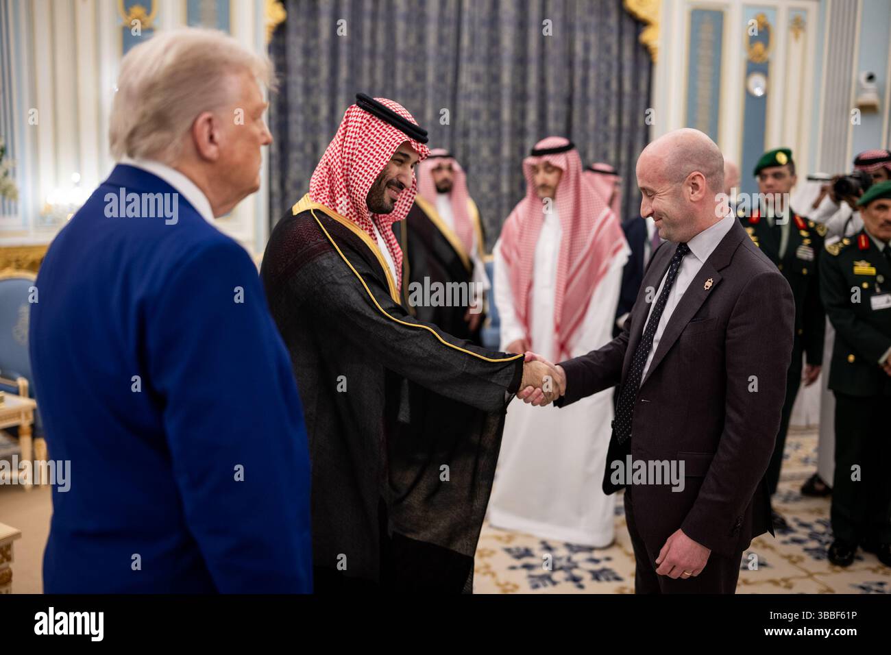 President Donald Trump greets officials during a welcome ceremony at ...