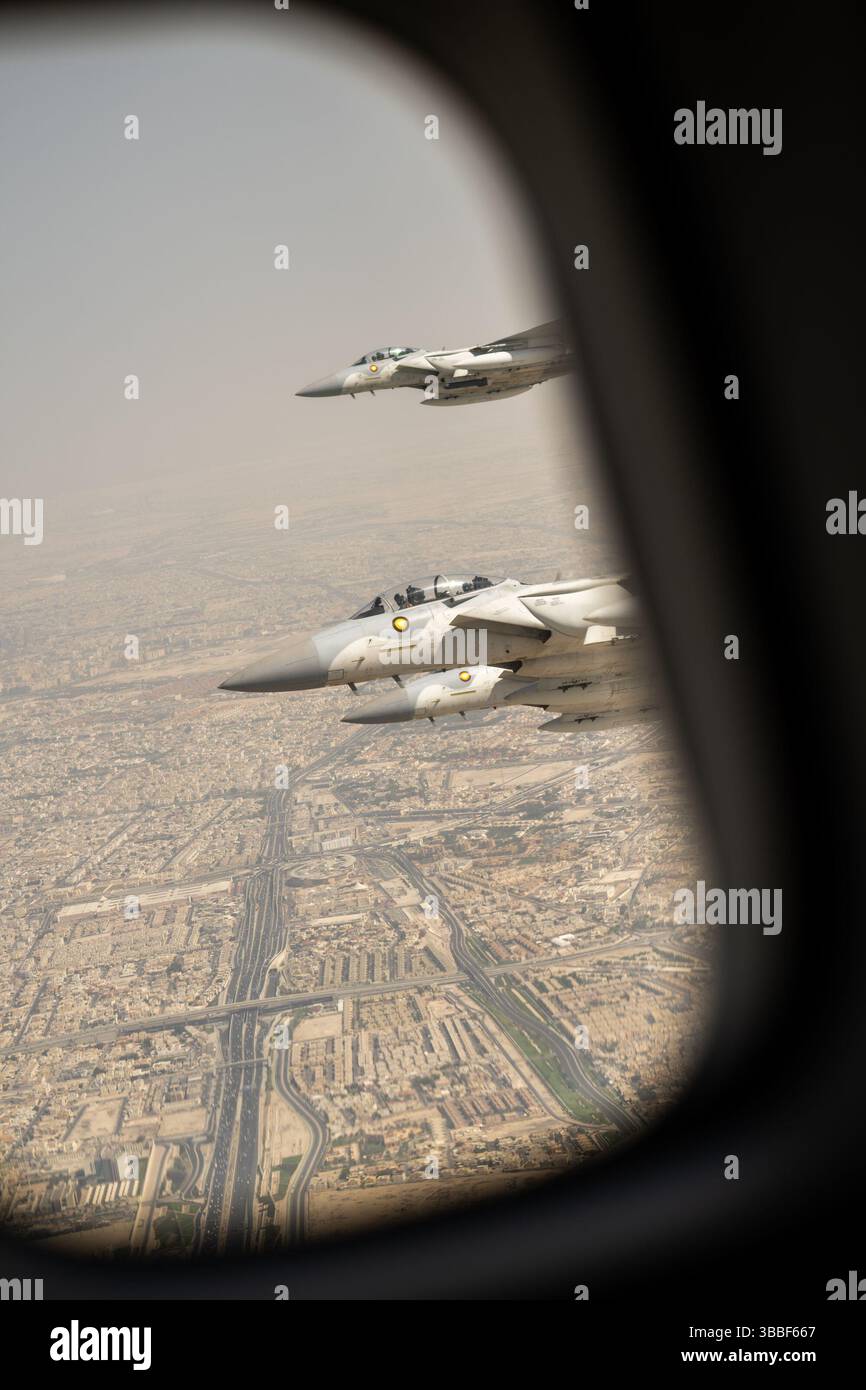 Qatari jets escort Air Force One before landing at Hamad International ...