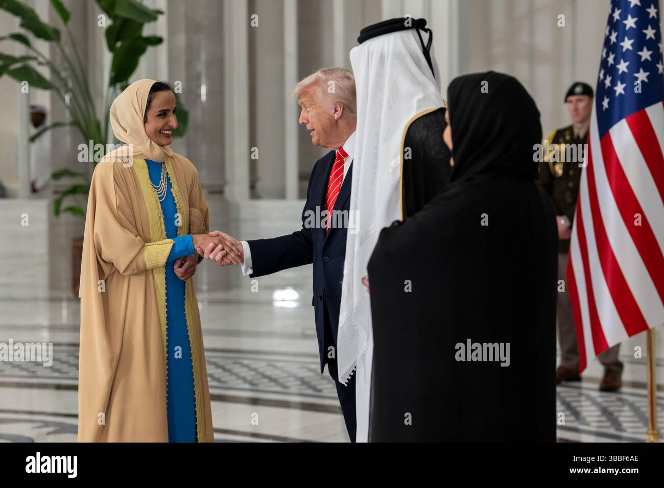 President Donald Trump participates in a receiving line with Amir of ...