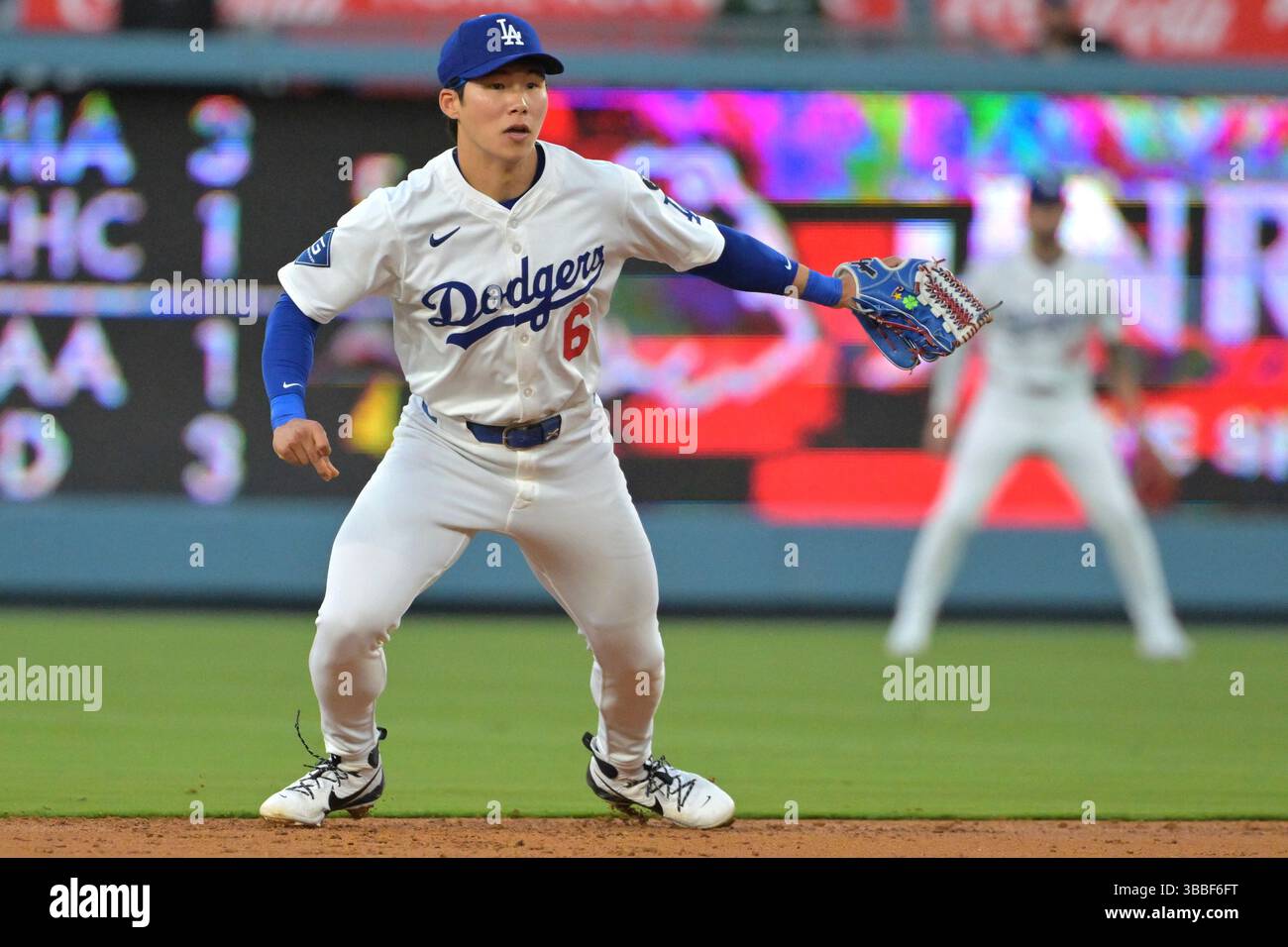 Los Angeles Dodgers second baseman Hyeseong Kim gets set for a ground ...