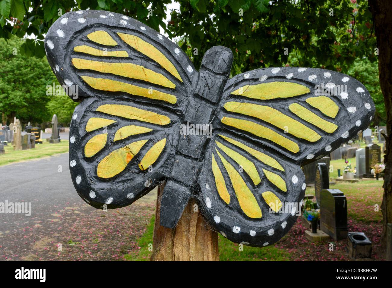 Wood carving of a butterfly in Philips Park cemetery, Miles Platting ...