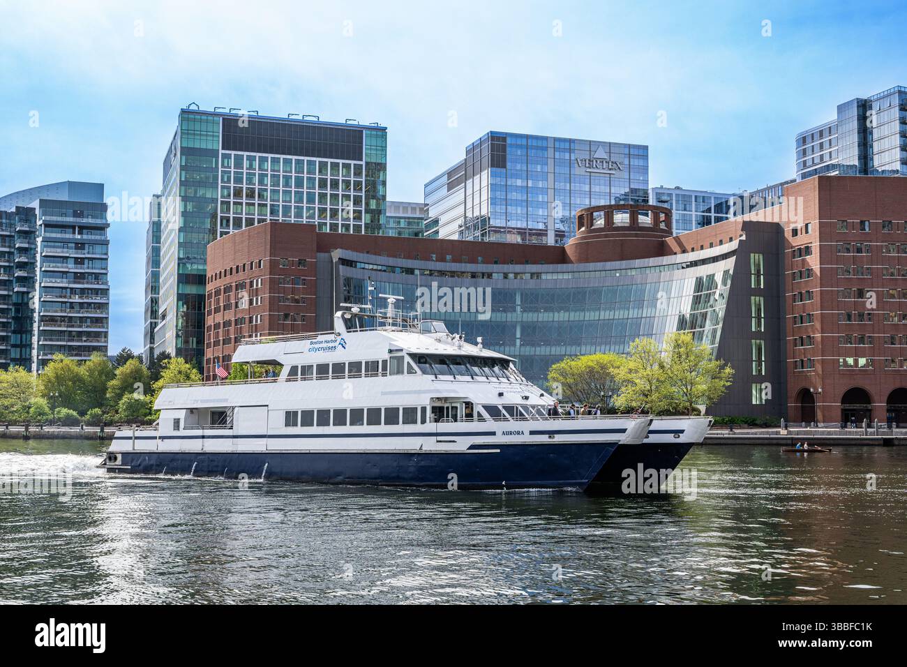 Boston commuters and visitors on holiday arrive by ferry boat at Long ...