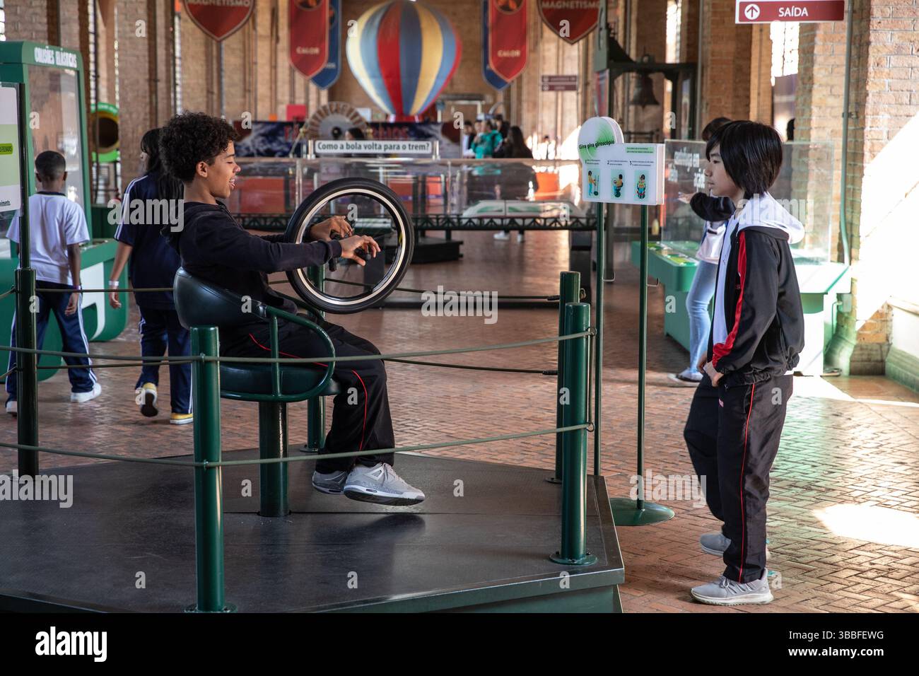 Sao Paulo, Brazil. 15th May, 2025. A student tries out a gyroscopic ...