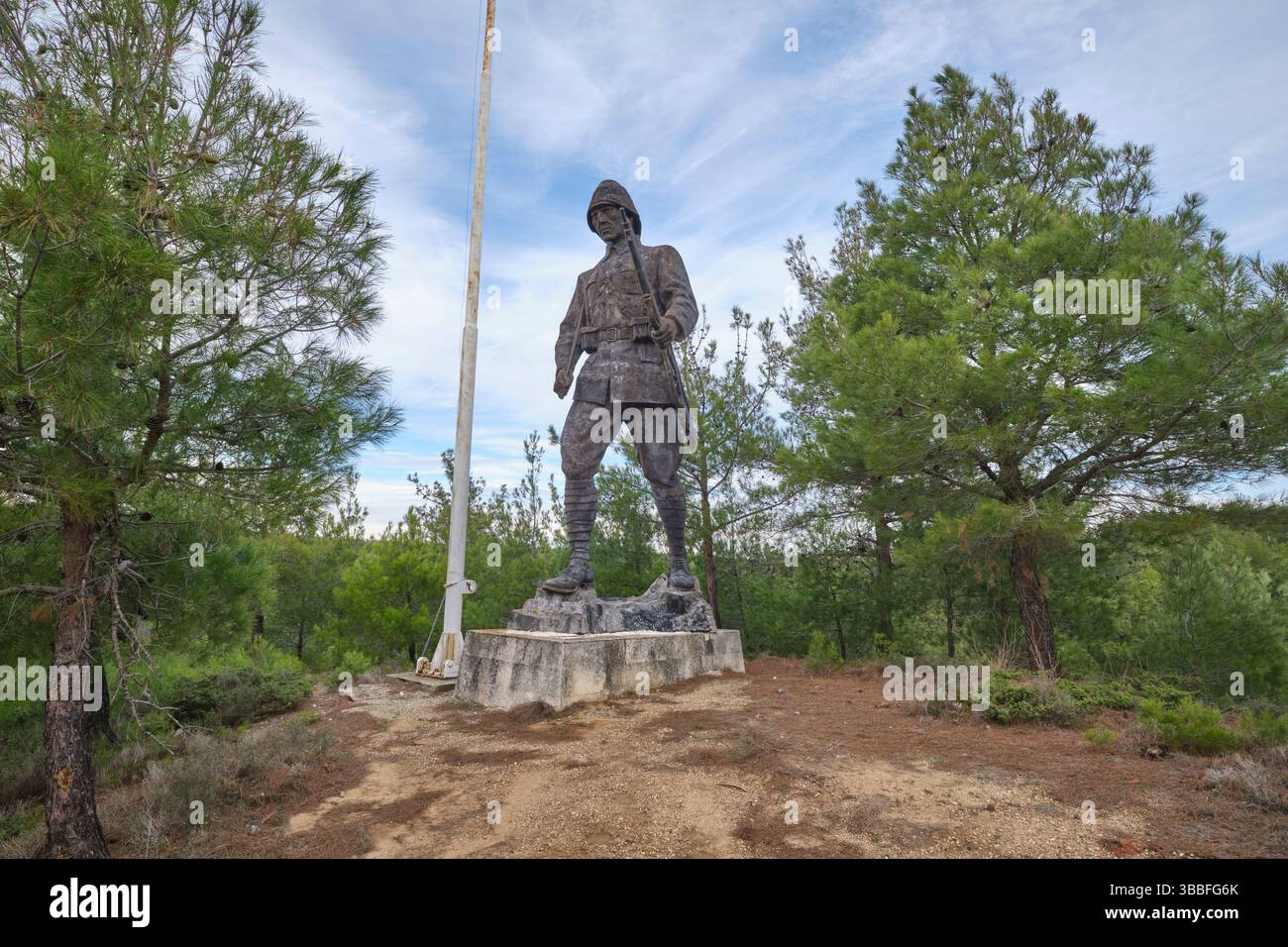 A memorial statue to the unknown Turkish soldier, with a rifle and a ...