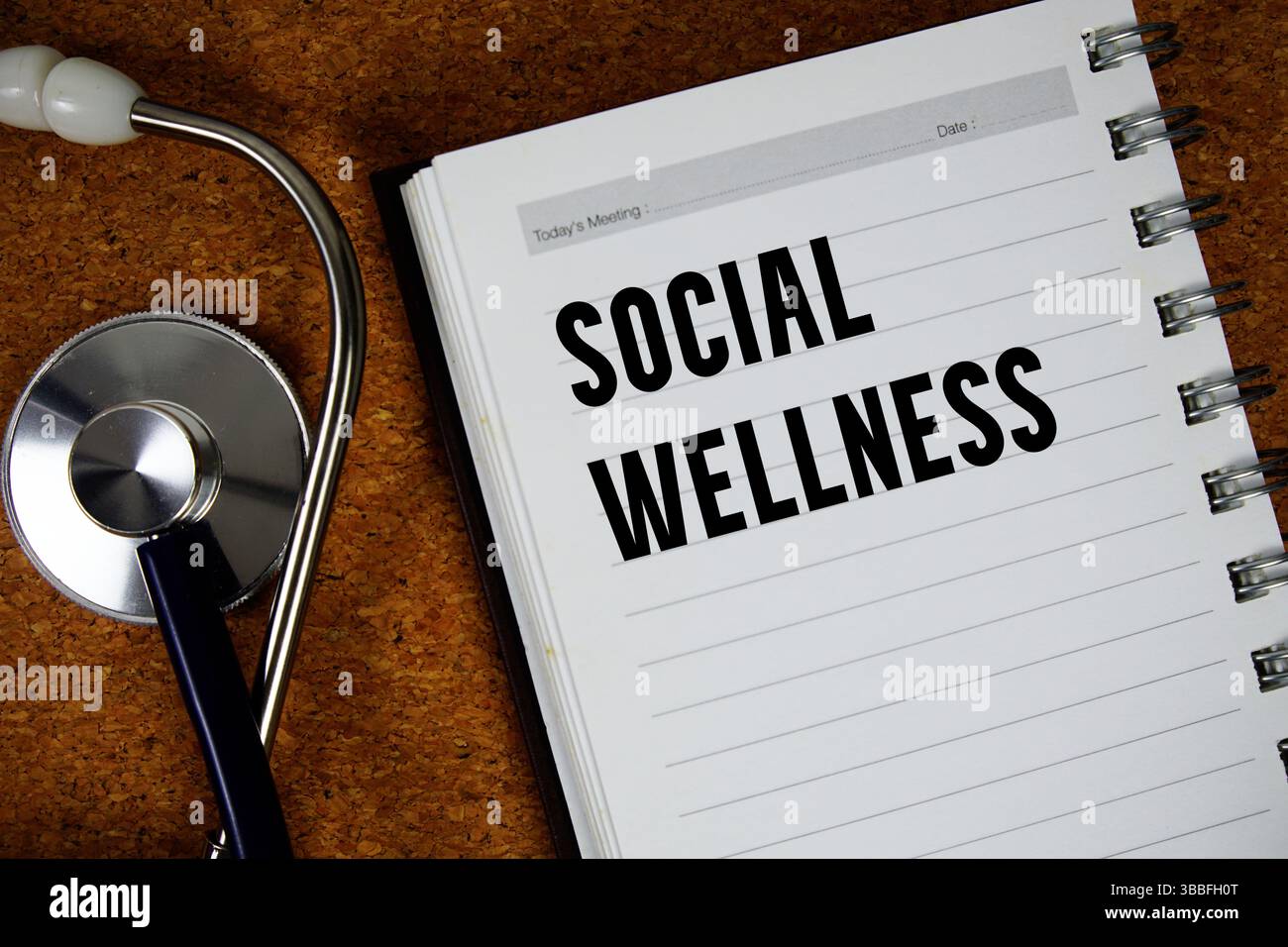 Social Wellness text on paper with stethoscope flat lay on cork board ...