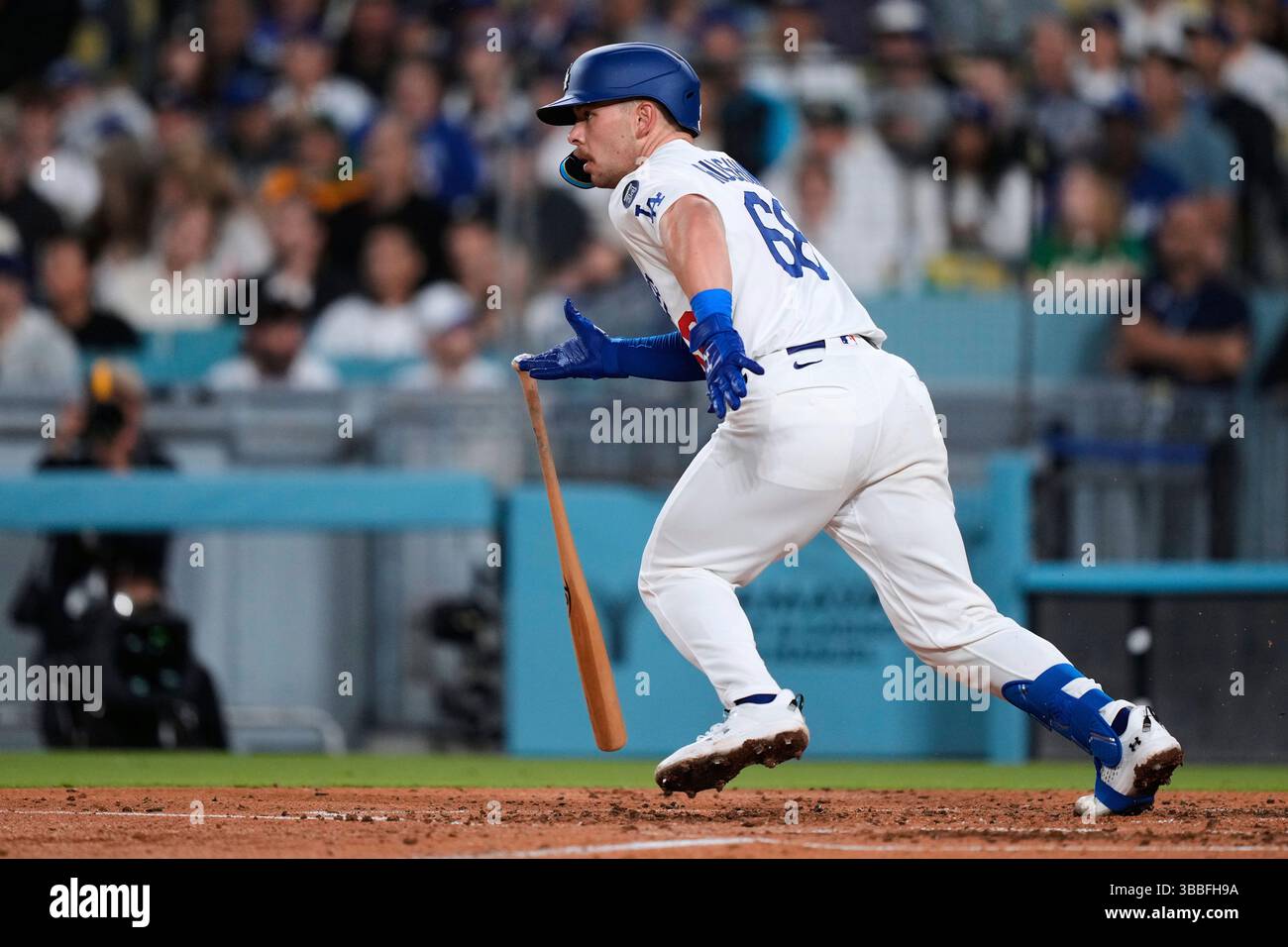 Los Angeles Dodgers' Dalton Rushing runs after hitting a single during ...