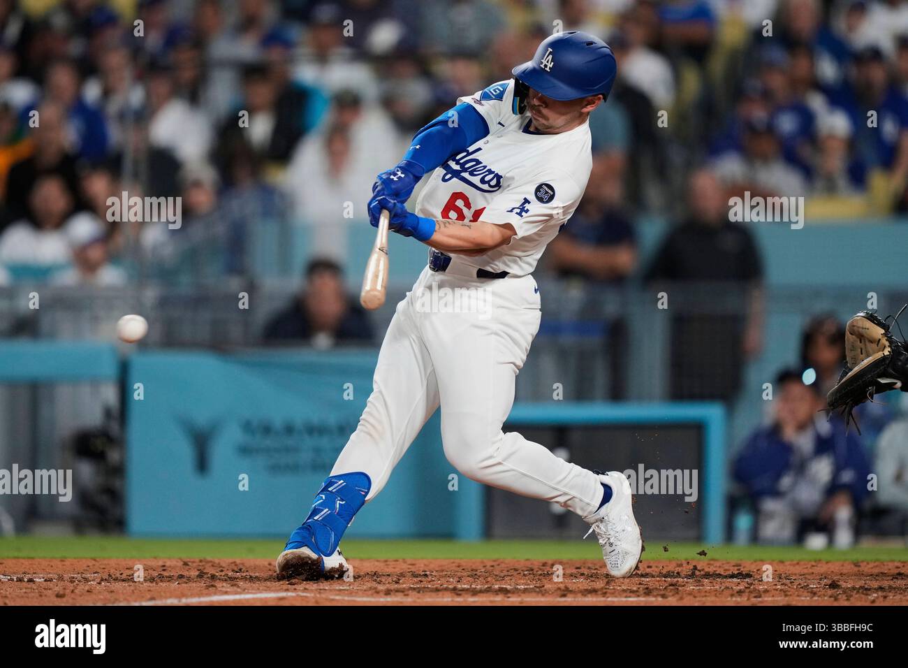 Los Angeles Dodgers' Dalton Rushing hits a single during the third ...