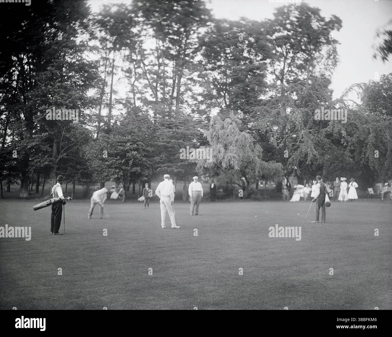 Vice President James Sherman putting while playing golf at the Chevy ...