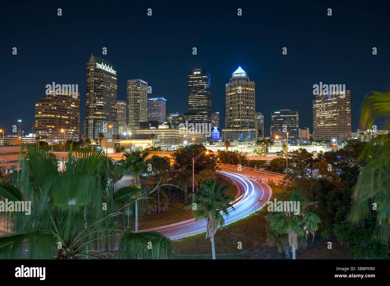 Downtown of Tampa city in Florida, USA. Car traffic on highway road and ...