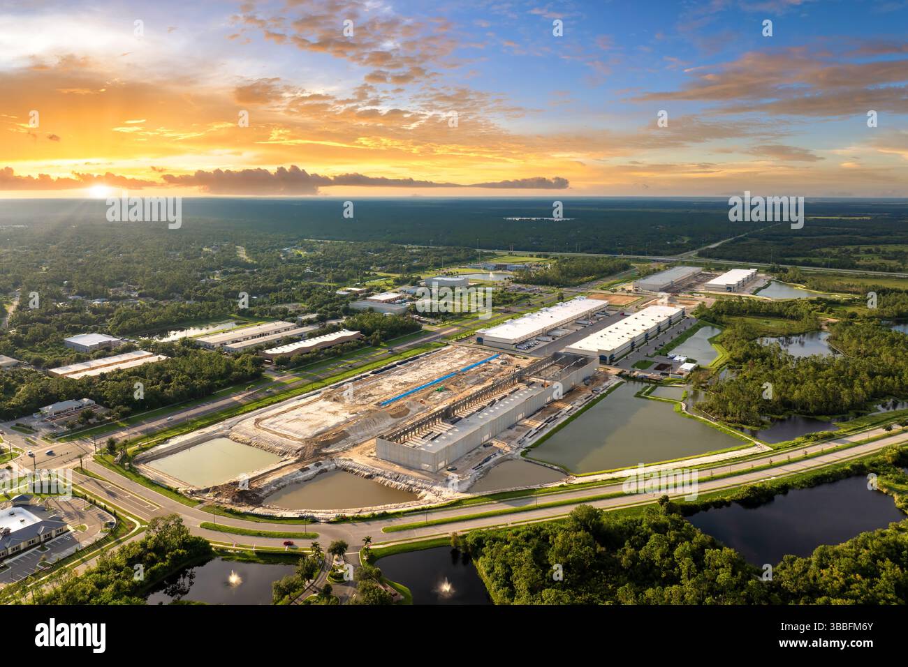Industrial warehouse construction site. Assembling of metal and ...