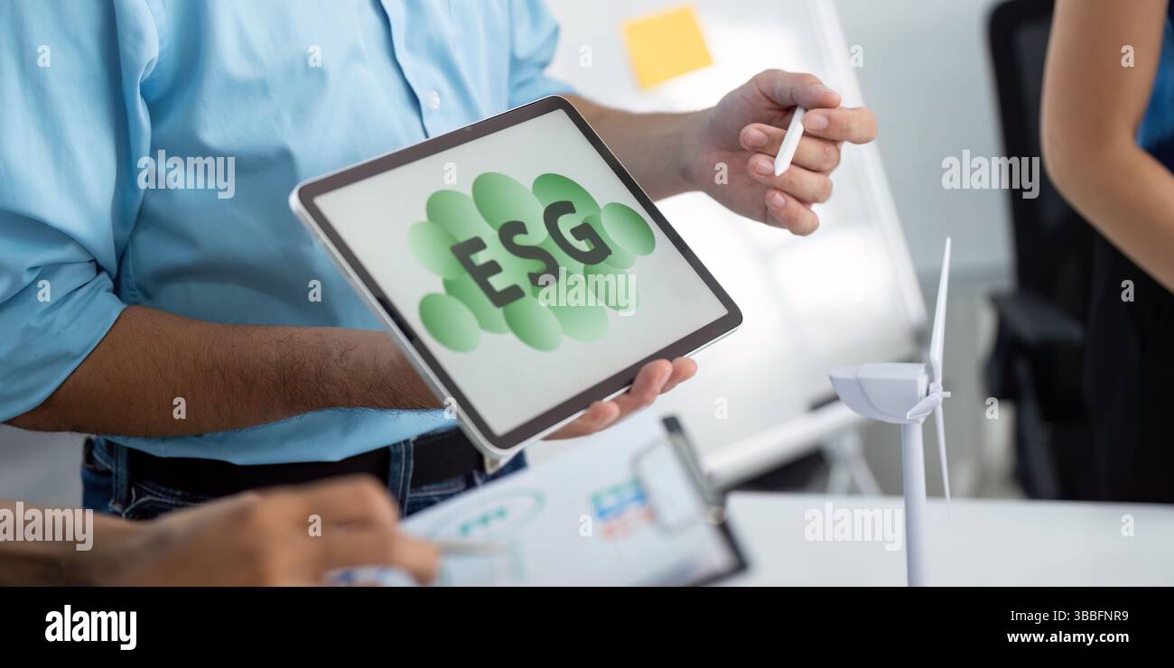 ESG and Sustainability. Professional presenting ESG concepts on a ...