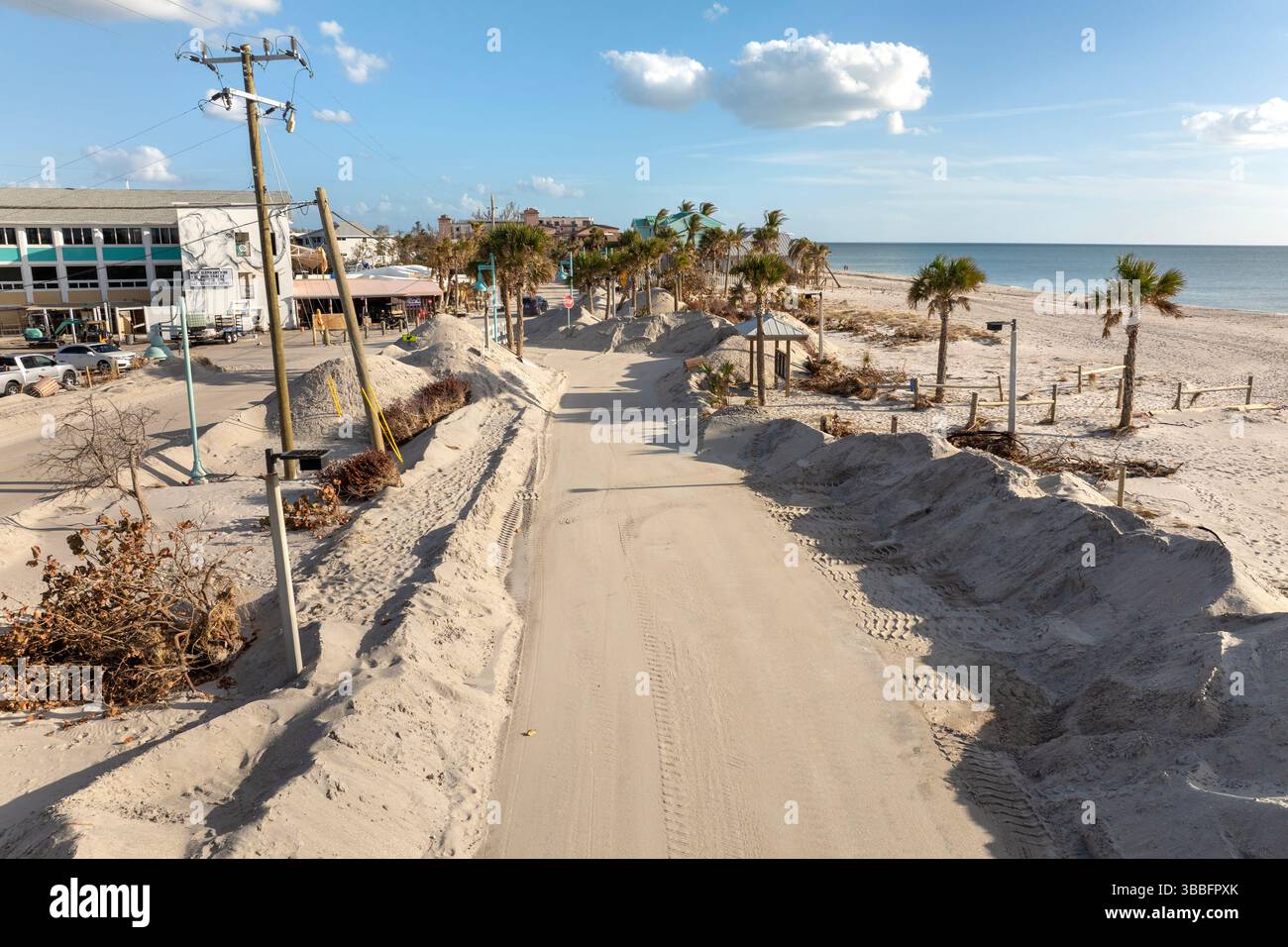 Trash from severely damaged houses after hurricane Milton storm surge ...