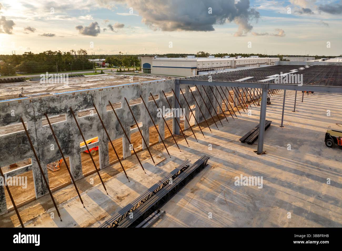 Warehouse construction. Concrete and metal structure of industrial ...