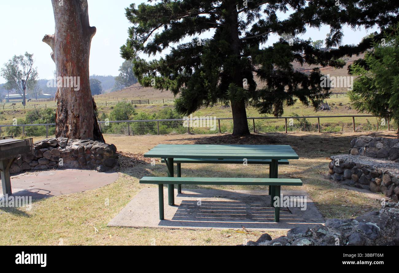 Picnic table bench and trees at EM Tilley Park near Rathdowney in ...