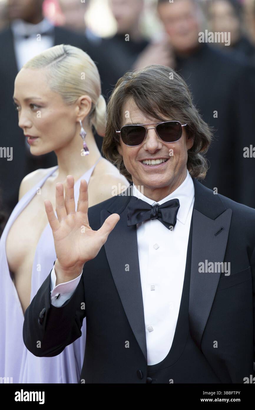 Cannes, France - 14.5.2024: Pom Klementieff and Tom Cruise during the ...