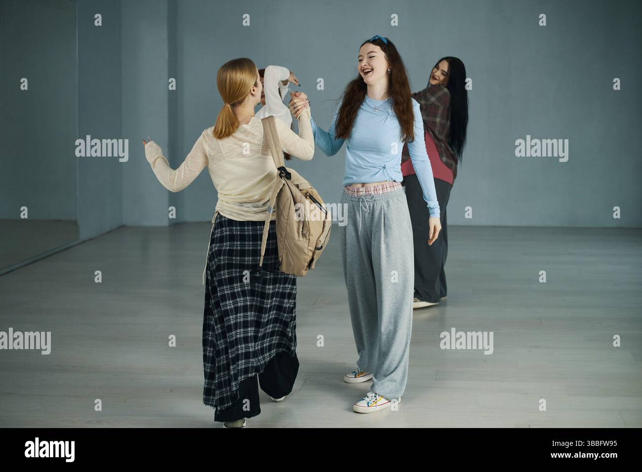 Dancing Practice in Studio with Group of Young Women Stock Photo - Alamy