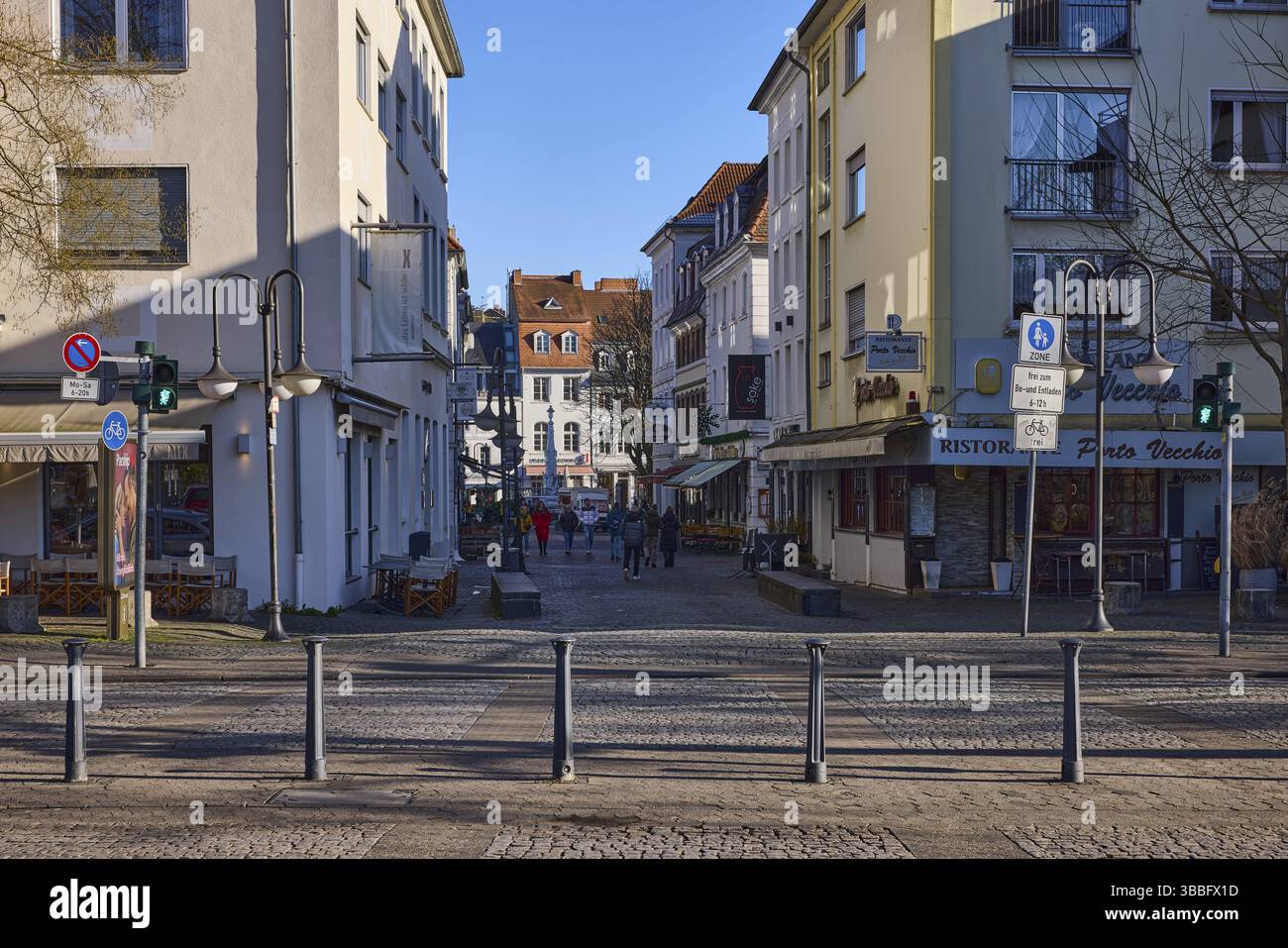 Pedestrian crossing with traffic lights, bollards, general architecture ...