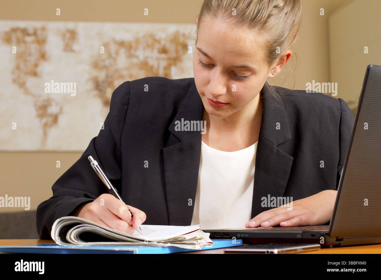 Focused female student works hi-res stock photography and images - Alamy