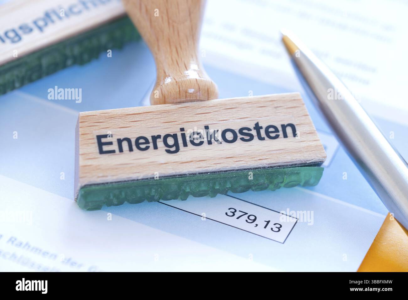 A stamp labelled Energy costs Stock Photo - Alamy