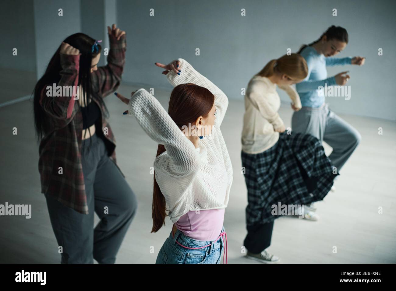 Diverse Group Practicing Dance Moves in Studio Setting Stock Photo - Alamy