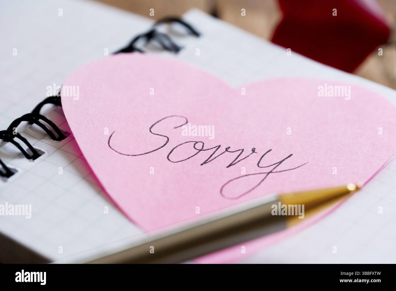 Heart sticker with the inscription Sorry Stock Photo - Alamy