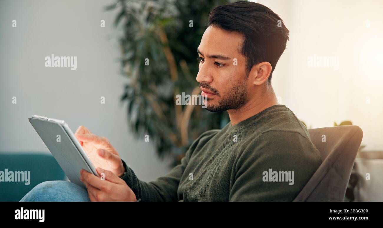 Reading, sign in and tablet with man in waiting room of office for ...